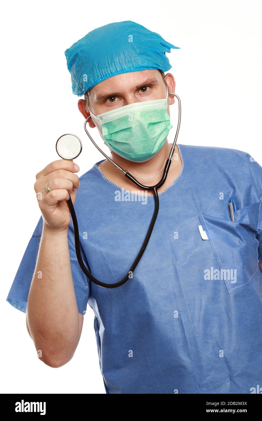 A vertical shot of a young doctor with a stethoscope isolated on white ...