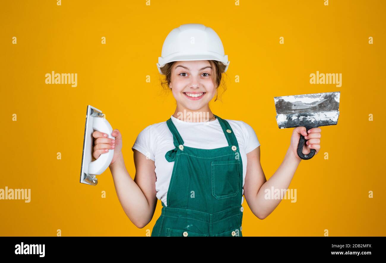 Welcome to my world. future engineer. happy kid use spatula repairing ...