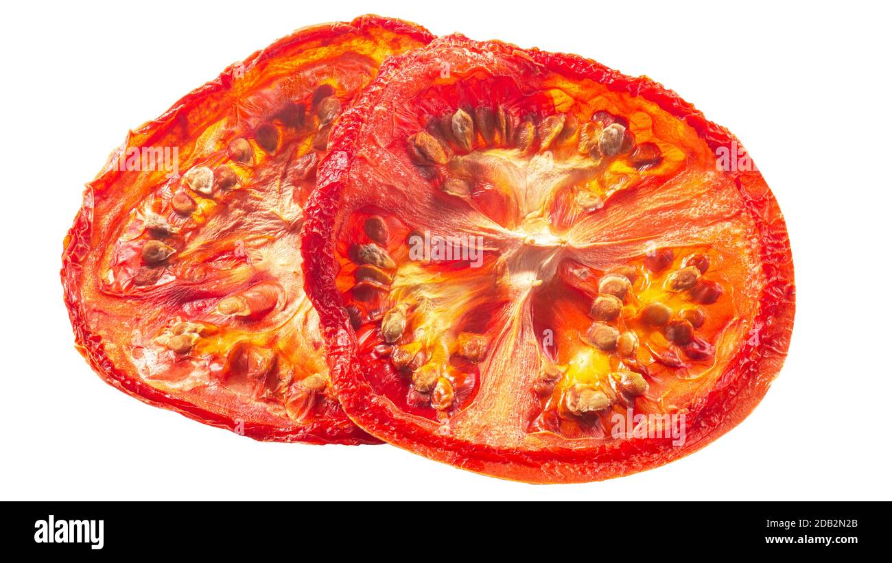 Tomato chips or thin dried slices, isolated Stock Photo - Alamy