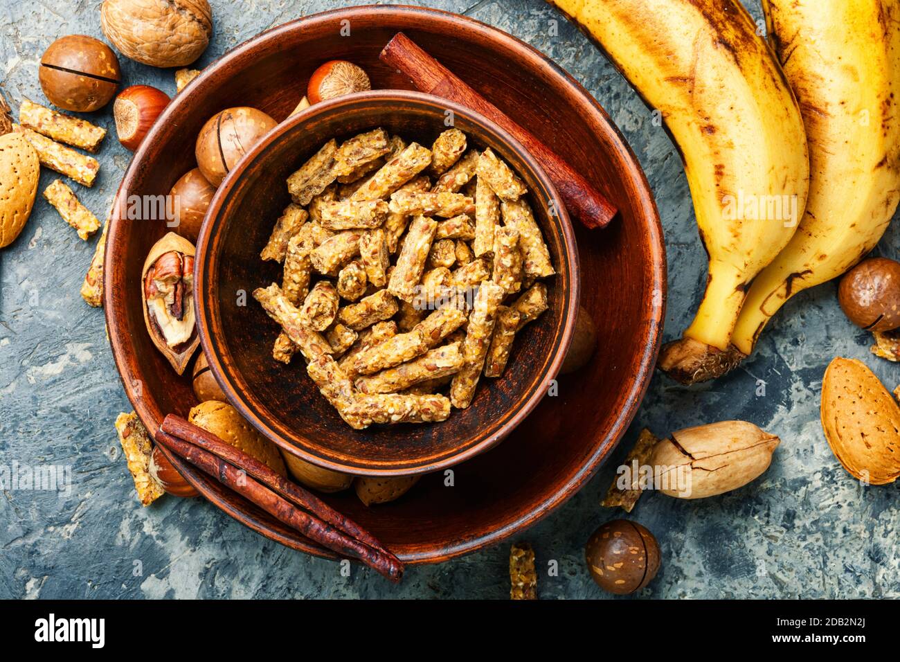 Organic uncooked granola cereal with mixed nuts Stock Photo - Alamy