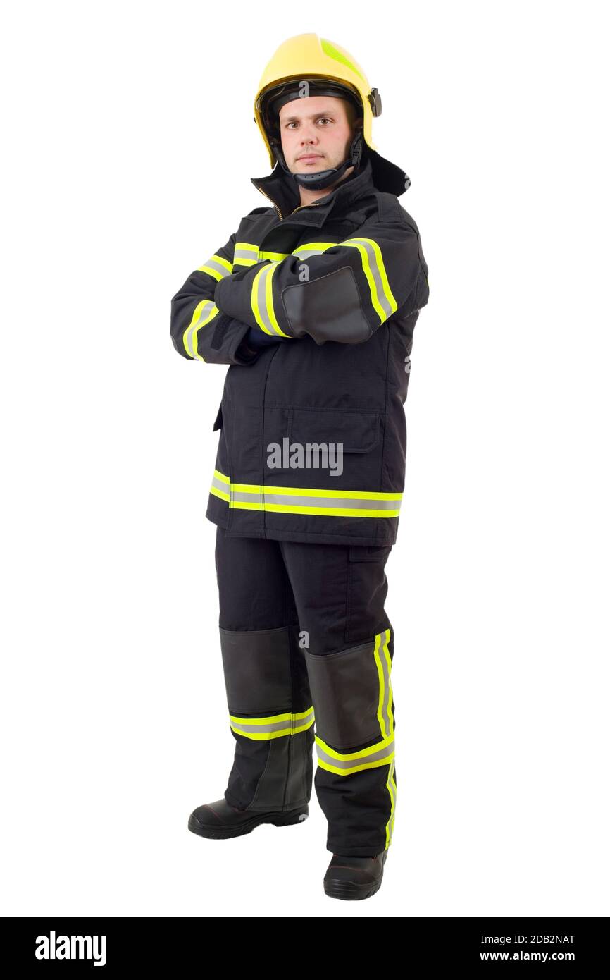 Serious firefighter posing with arms crossed. Full length studio shot ...