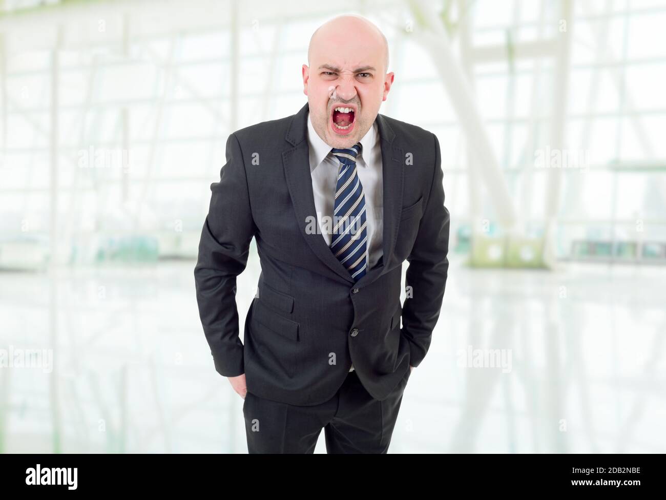 mad businessman yelling at the office Stock Photo - Alamy