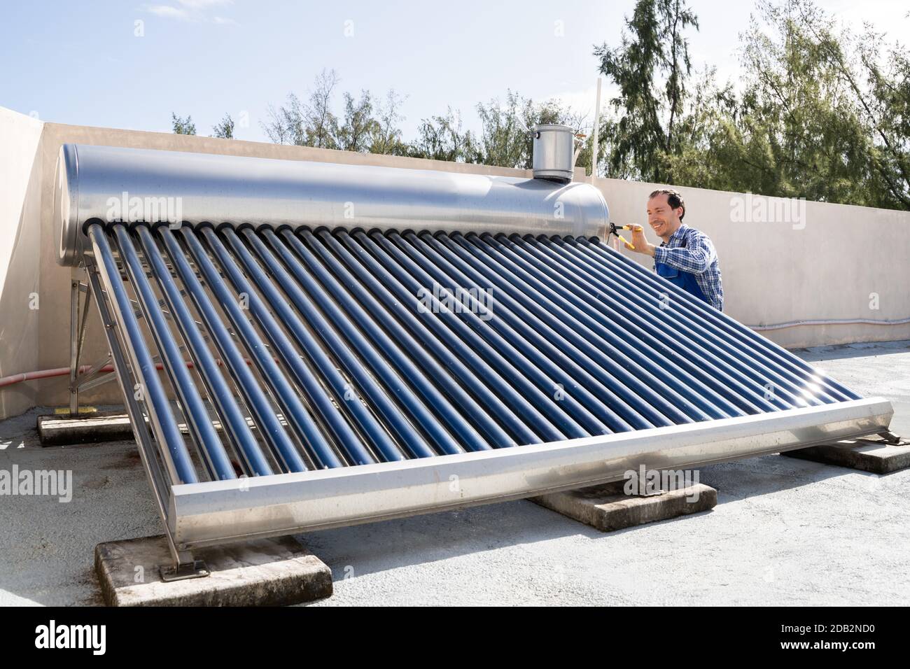 Solar water heater install hi-res stock photography and images - Alamy