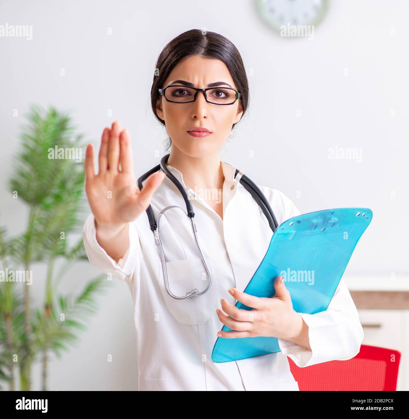 The woman doctor working in the hospital Stock Photo - Alamy