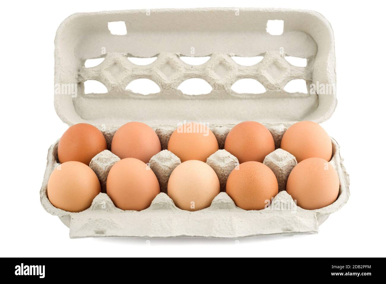 eggs in protective case foreground close-up isolated on white ...