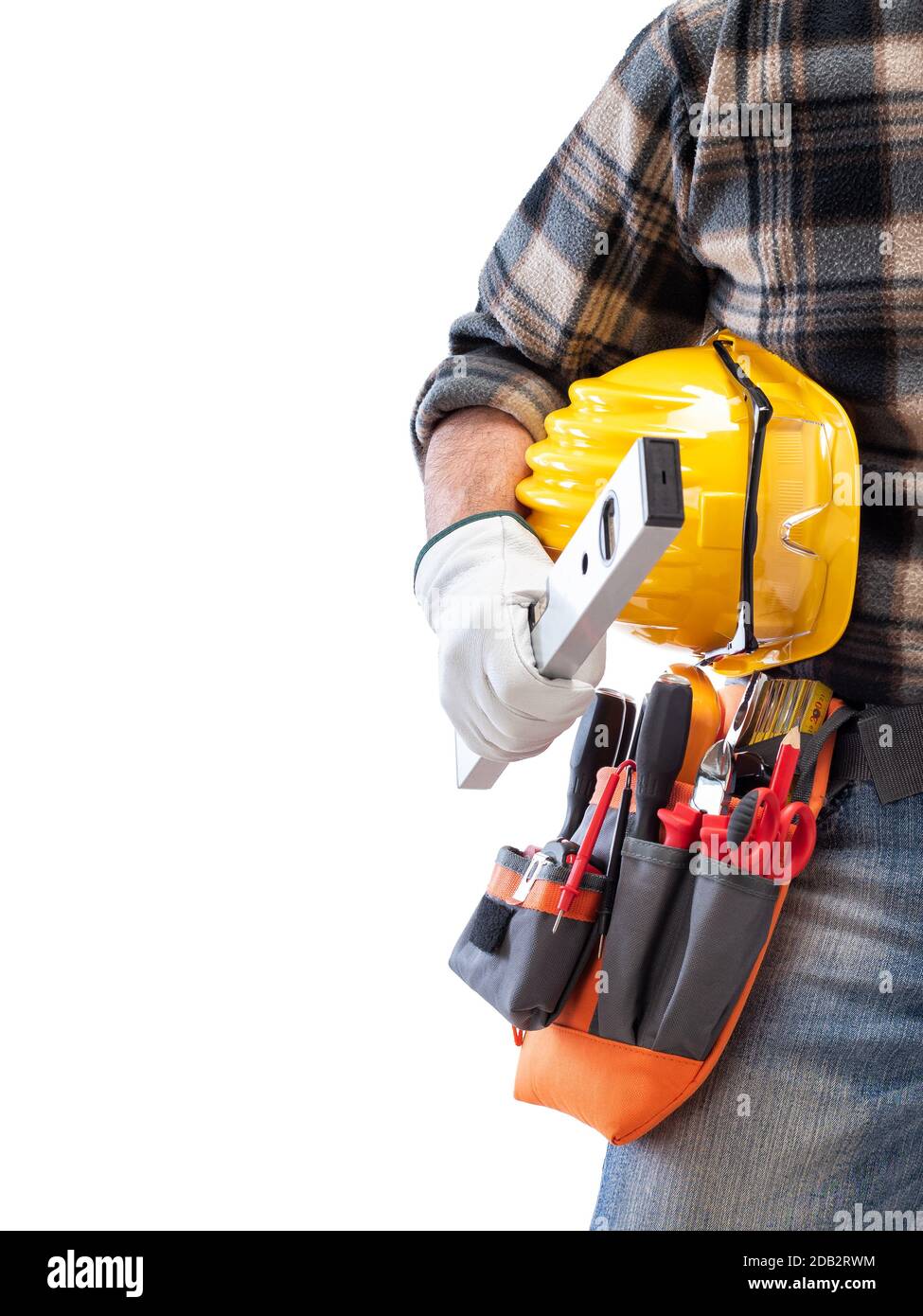 Electrician holds the level in his hand, helmet with protective goggles ...