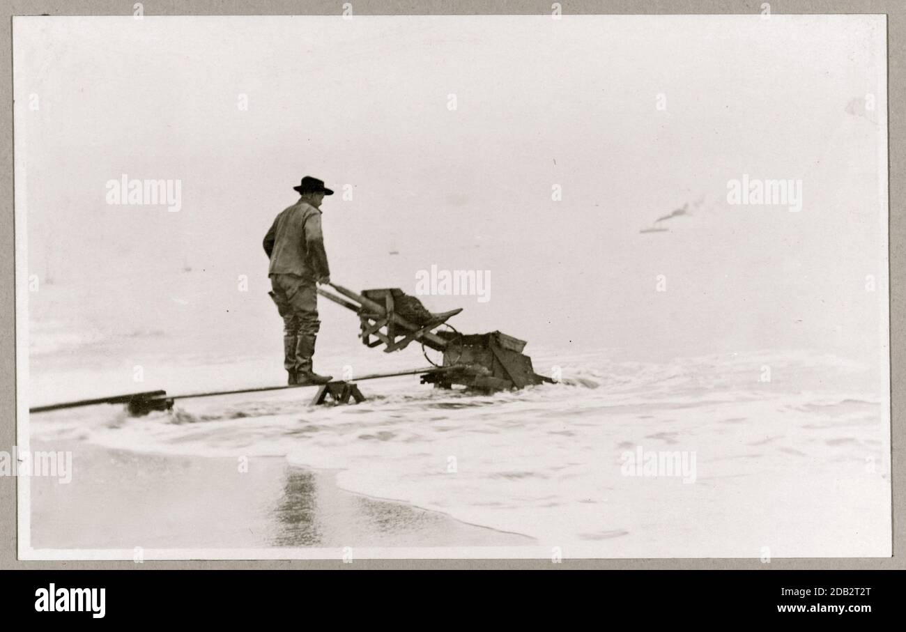 Mining on beach at Nome, Alaska Stock Photo - Alamy