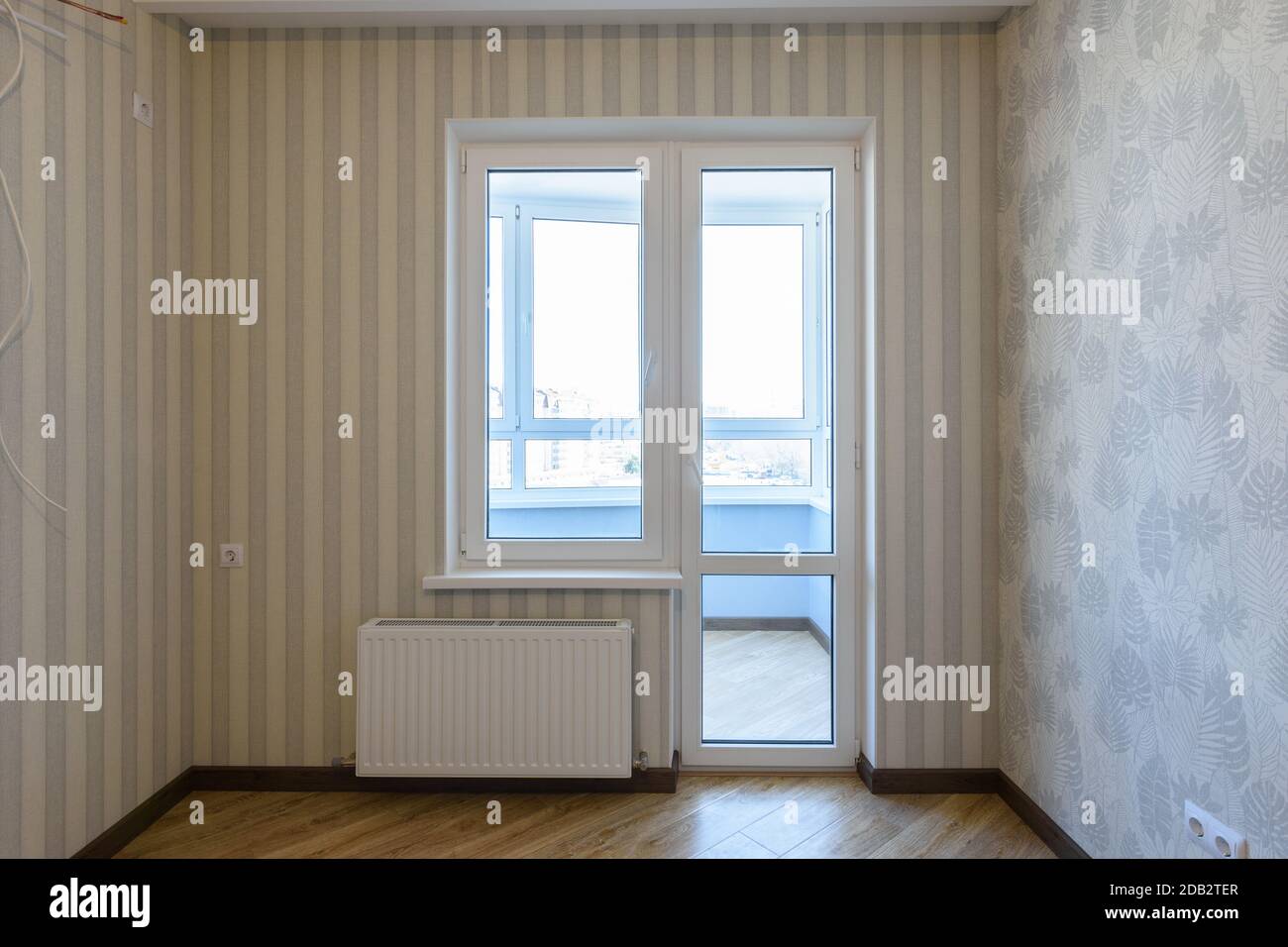 Exit to the balcony in the interior with plastic windows without ...