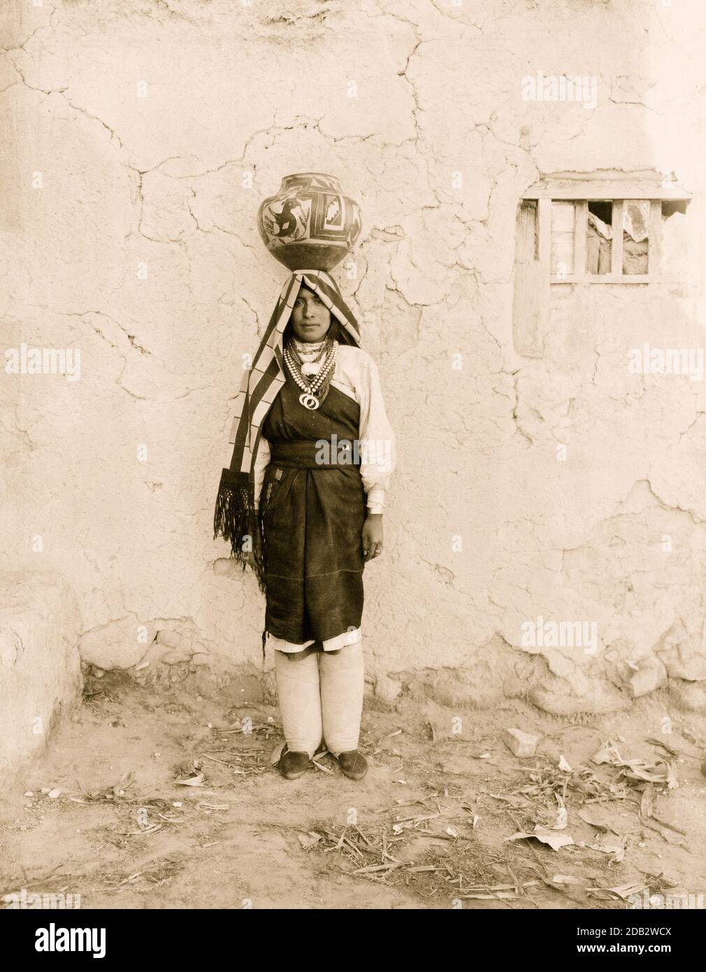 Laguna Pueblo Indian woman, full-length portrait, standing, facing ...