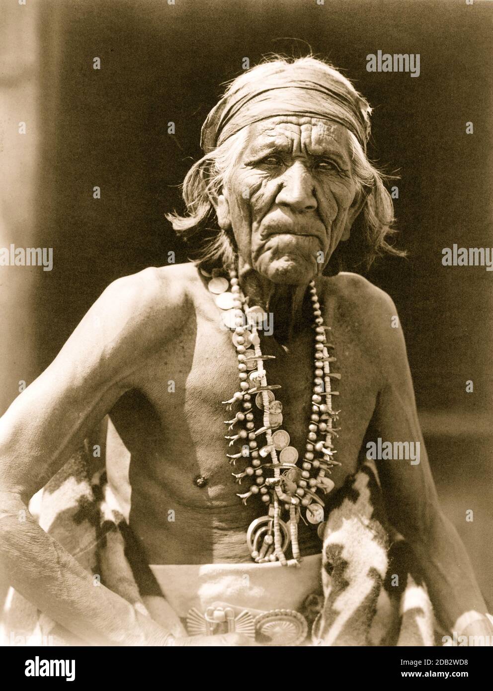 Many Goats, Navajo Indian, half-length portrait, seated, facing ...