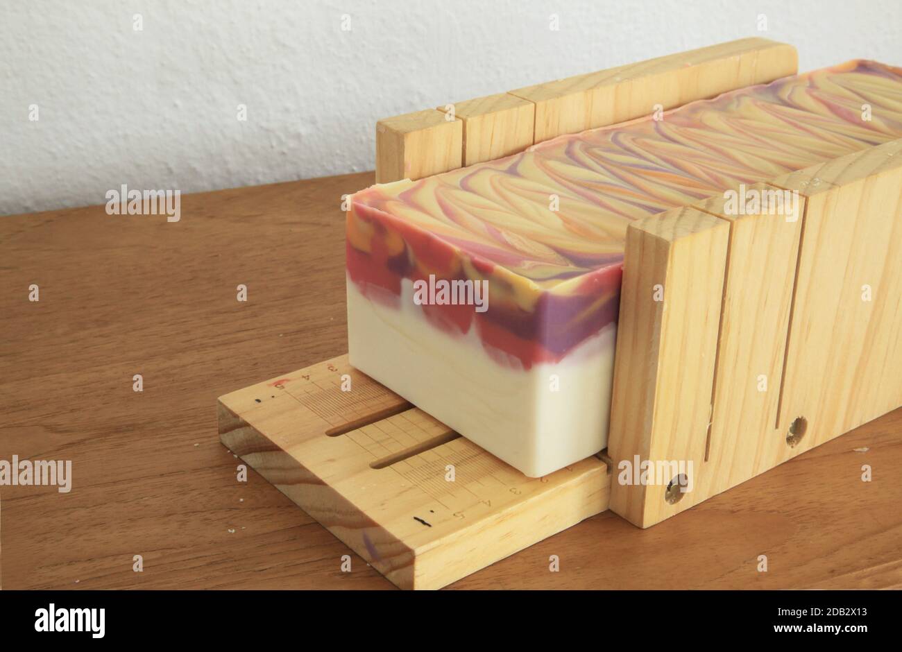 Handcrafted soap block ready to be cut into slices Stock Photo - Alamy
