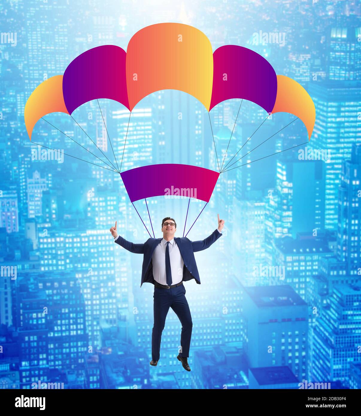 The young businessman falling on parachute in business concept Stock ...
