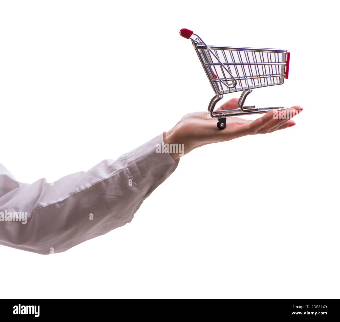 The hand holding shopping cart isolated on white Stock Photo - Alamy