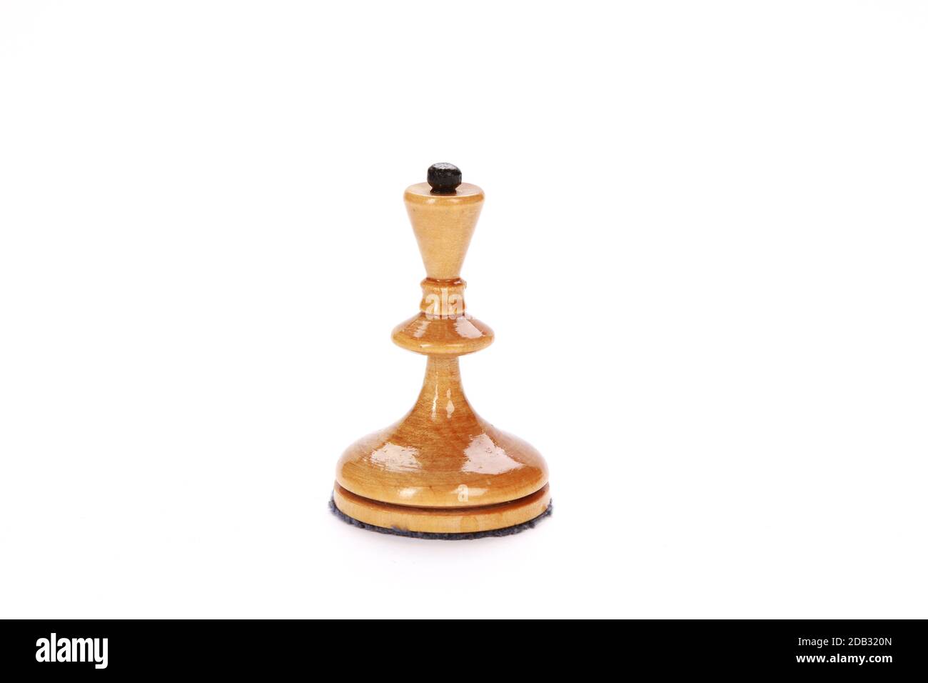 The white chess queen standing on a white background Stock Photo - Alamy
