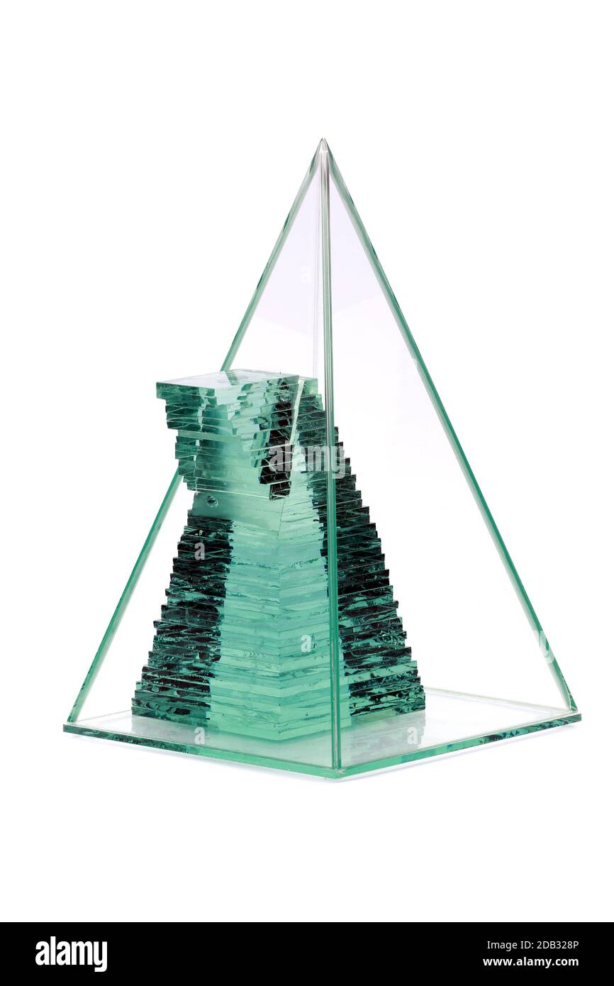 A vertical shot of a glass pyramid isolated on white background Stock ...