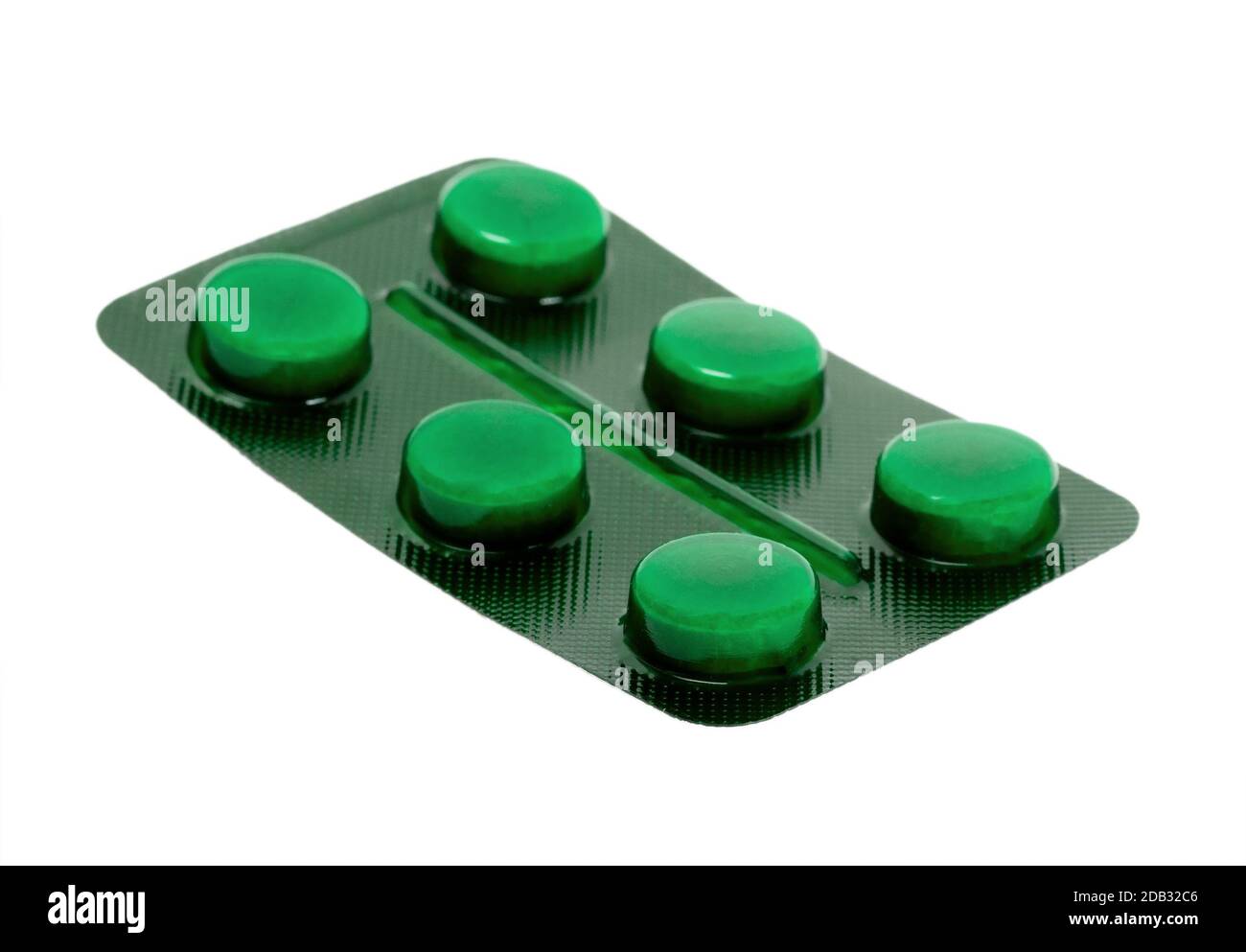 Row of pills on white Cut Out Stock Images & Pictures - Alamy