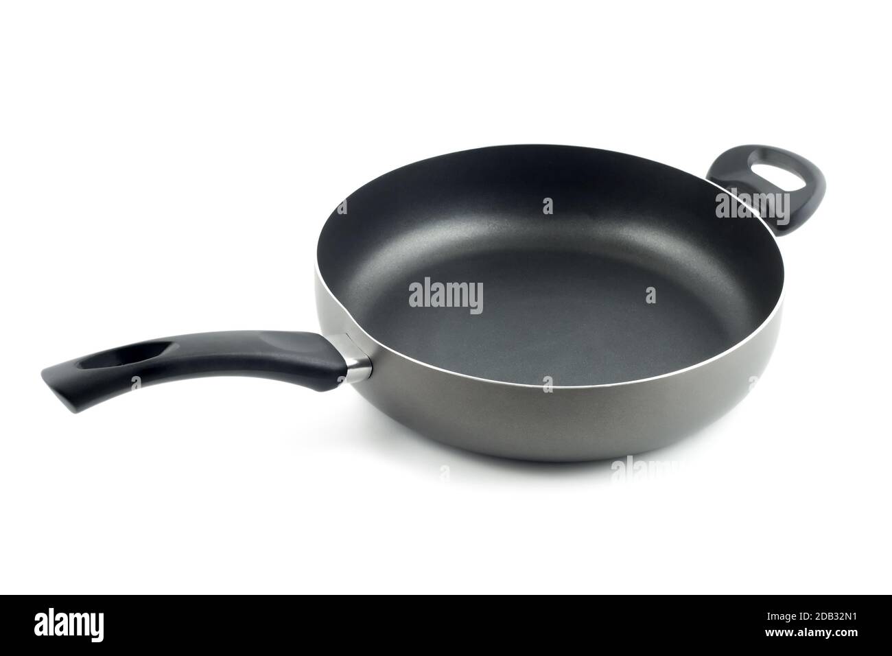 Fry pan close-up isolated on white background Stock Photo - Alamy