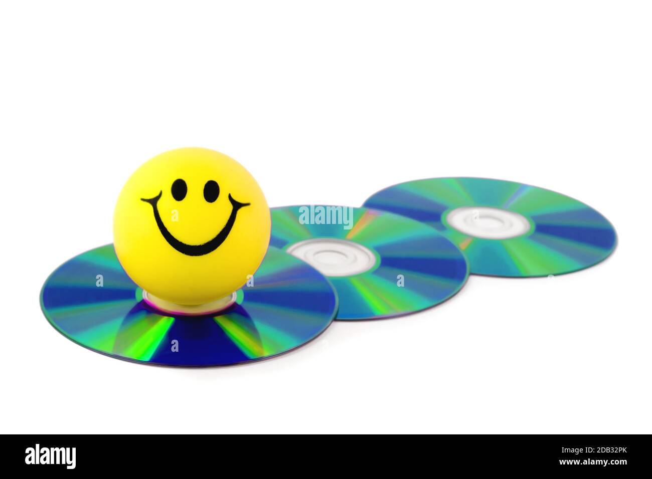 smiles on dvd disk computer close-up isolated on white background Stock ...