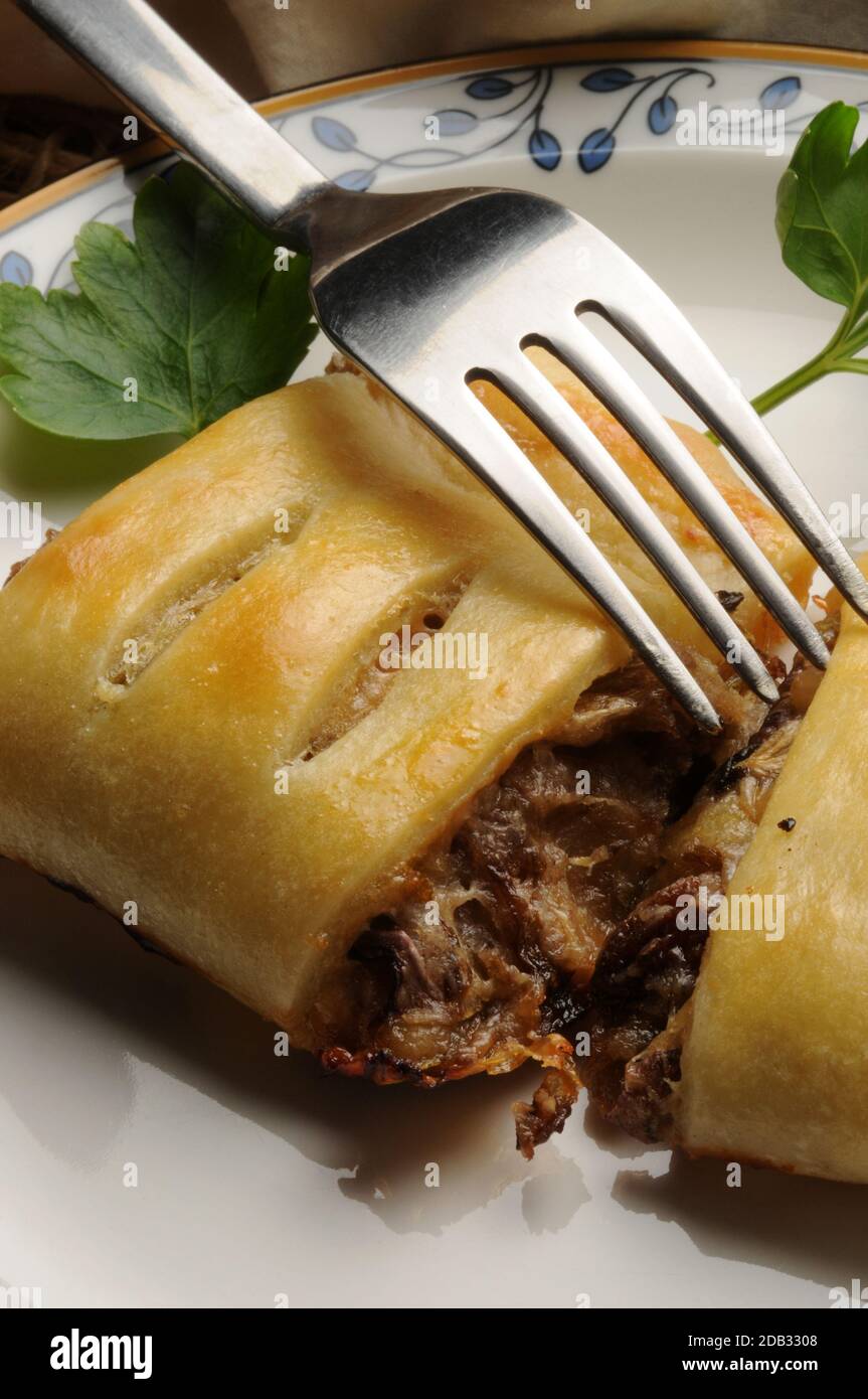 Baked puff pastry stuffed with vegetables Stock Photo - Alamy