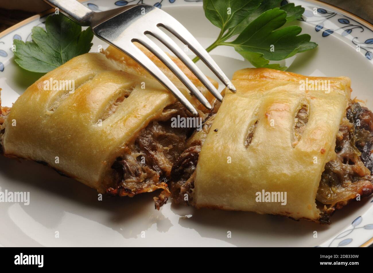 Baked puff pastry stuffed with vegetables Stock Photo - Alamy