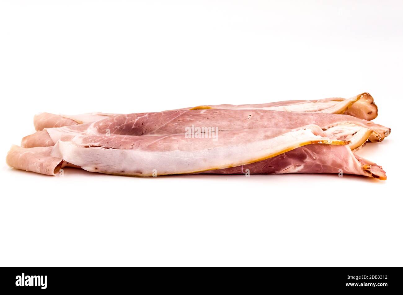 Cooked ham slice isolated Stock Photo - Alamy