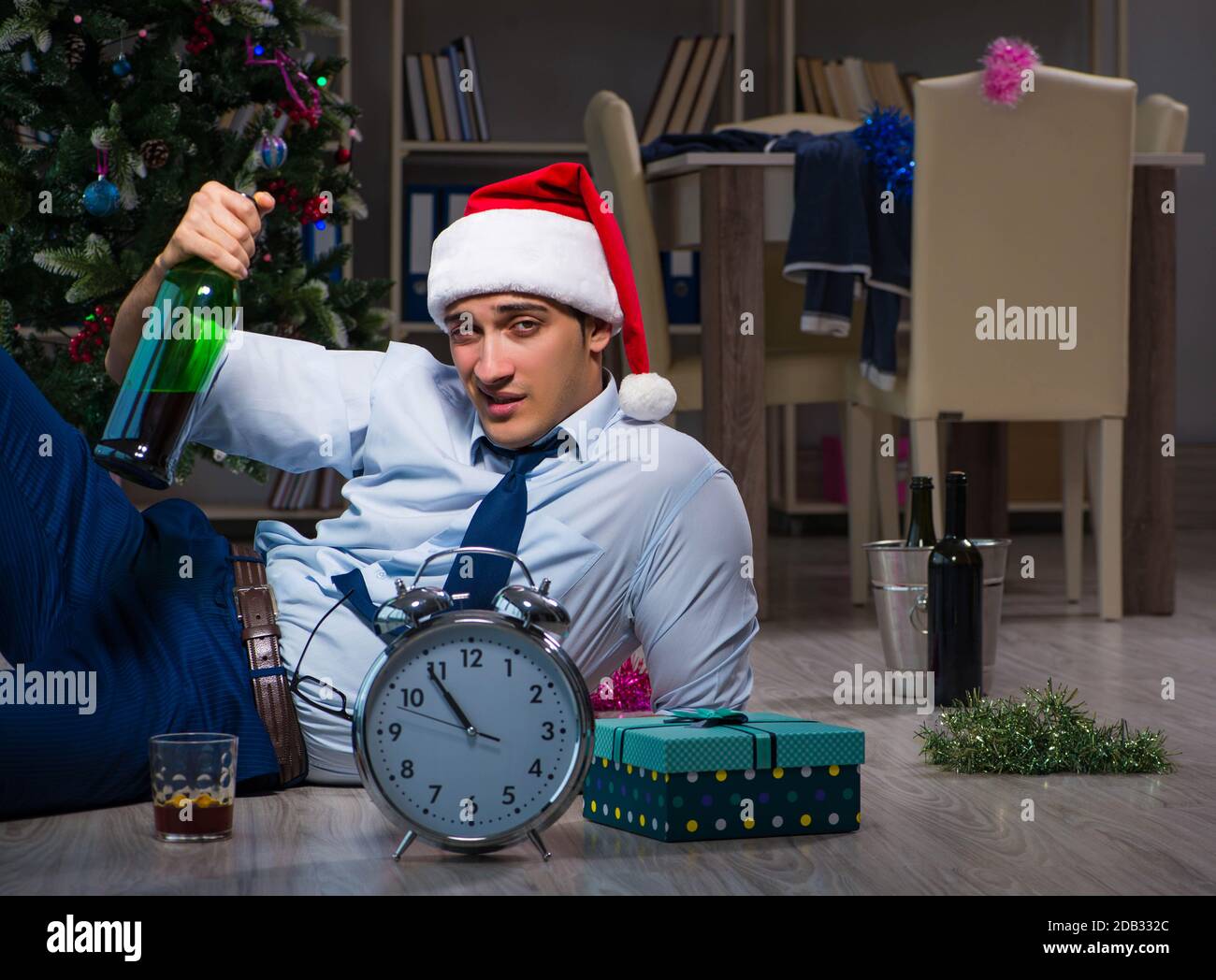 The businessman celebrating christmas at home alone Stock Photo - Alamy