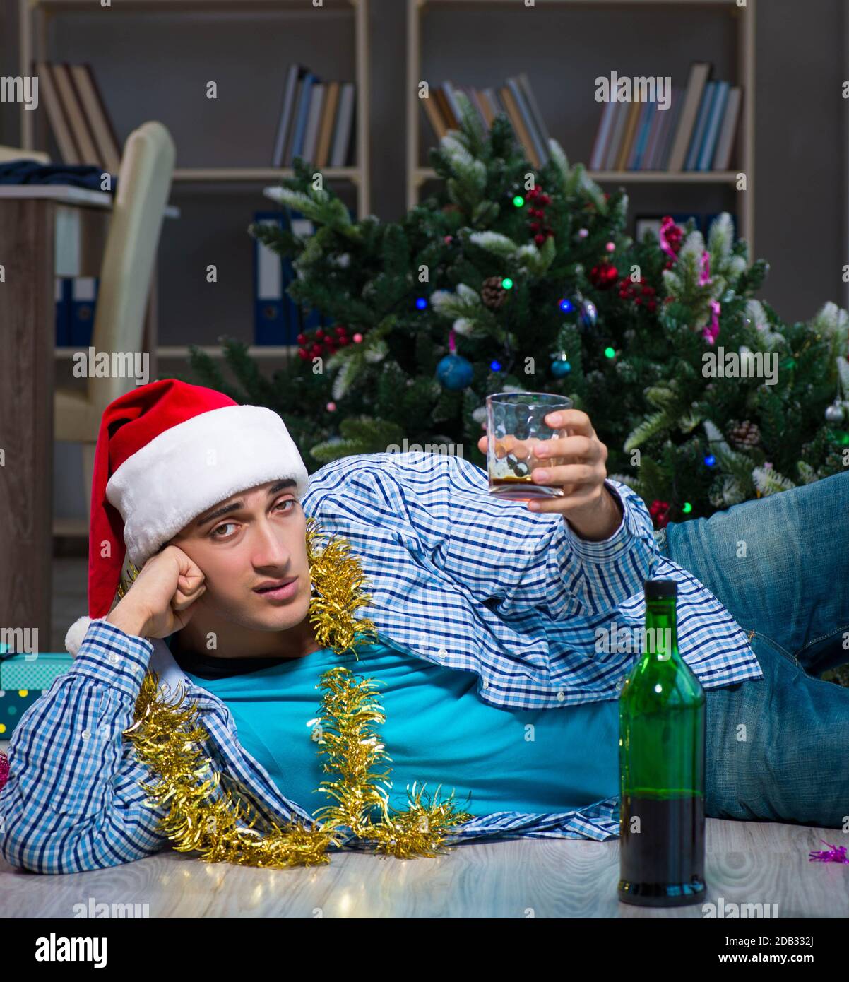 The man celebrating christmas at home alone Stock Photo - Alamy