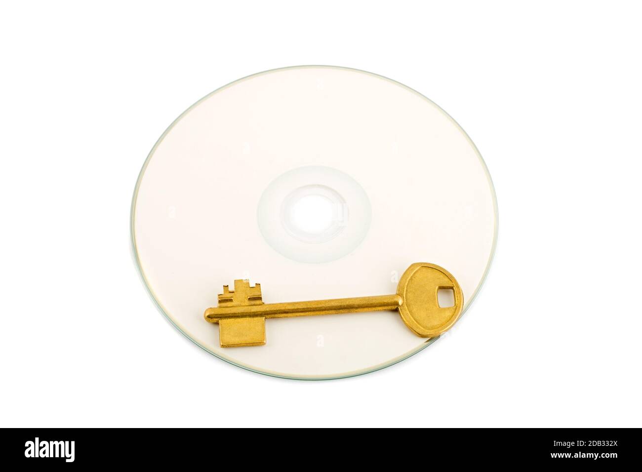 golden key on compact disk isolated on white background Stock Photo - Alamy