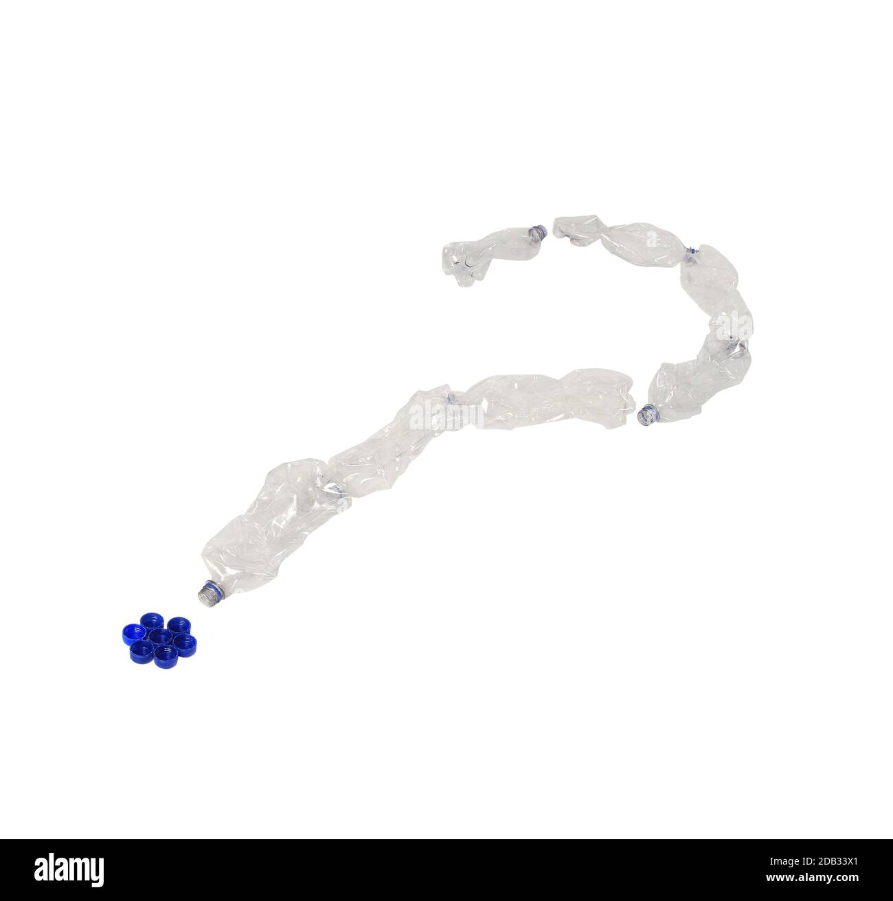 A vertical high angle shot of a question mark made of plastic bottles ...