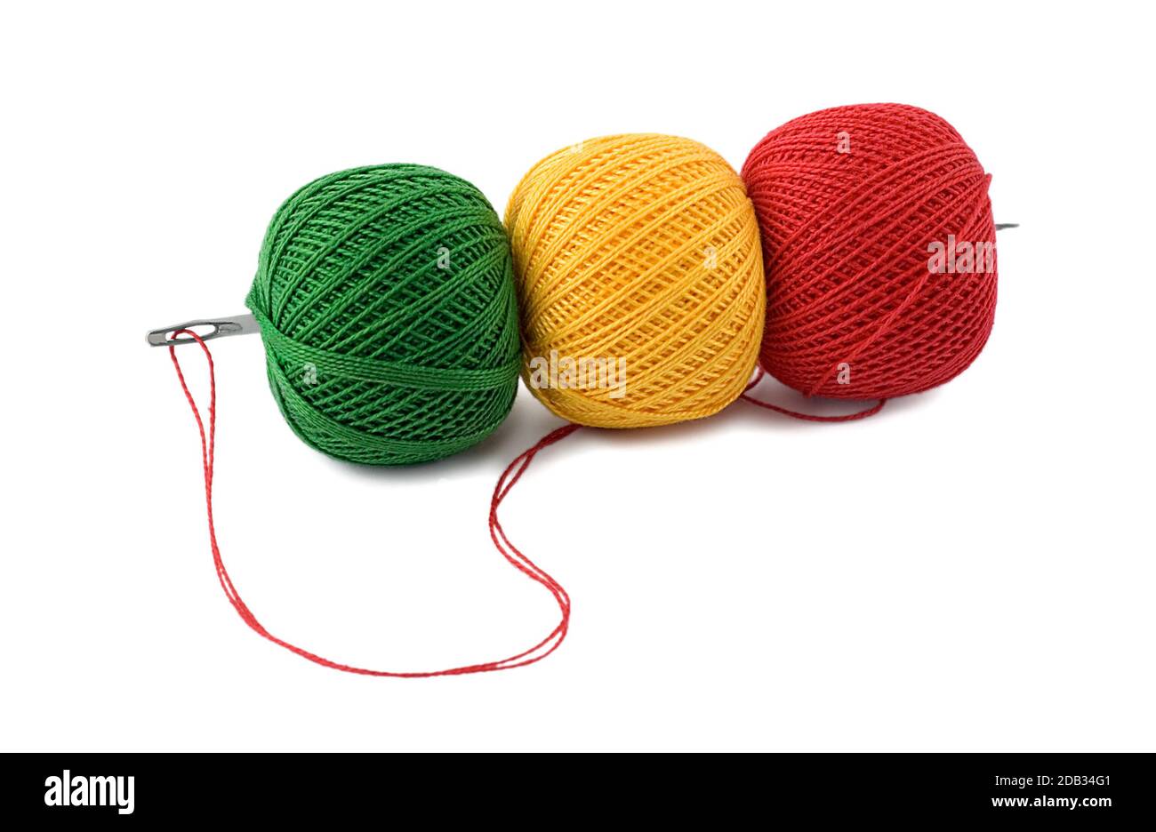 needle in embroidery threads isolated on white background Stock Photo ...