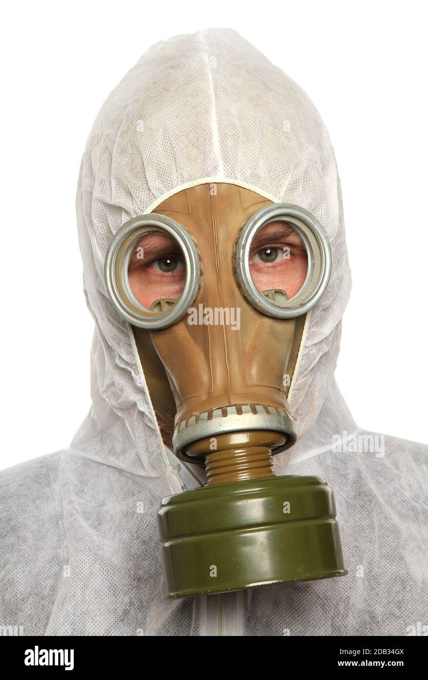 A portrait of a male in full protective clothing wearing a gas mask ...