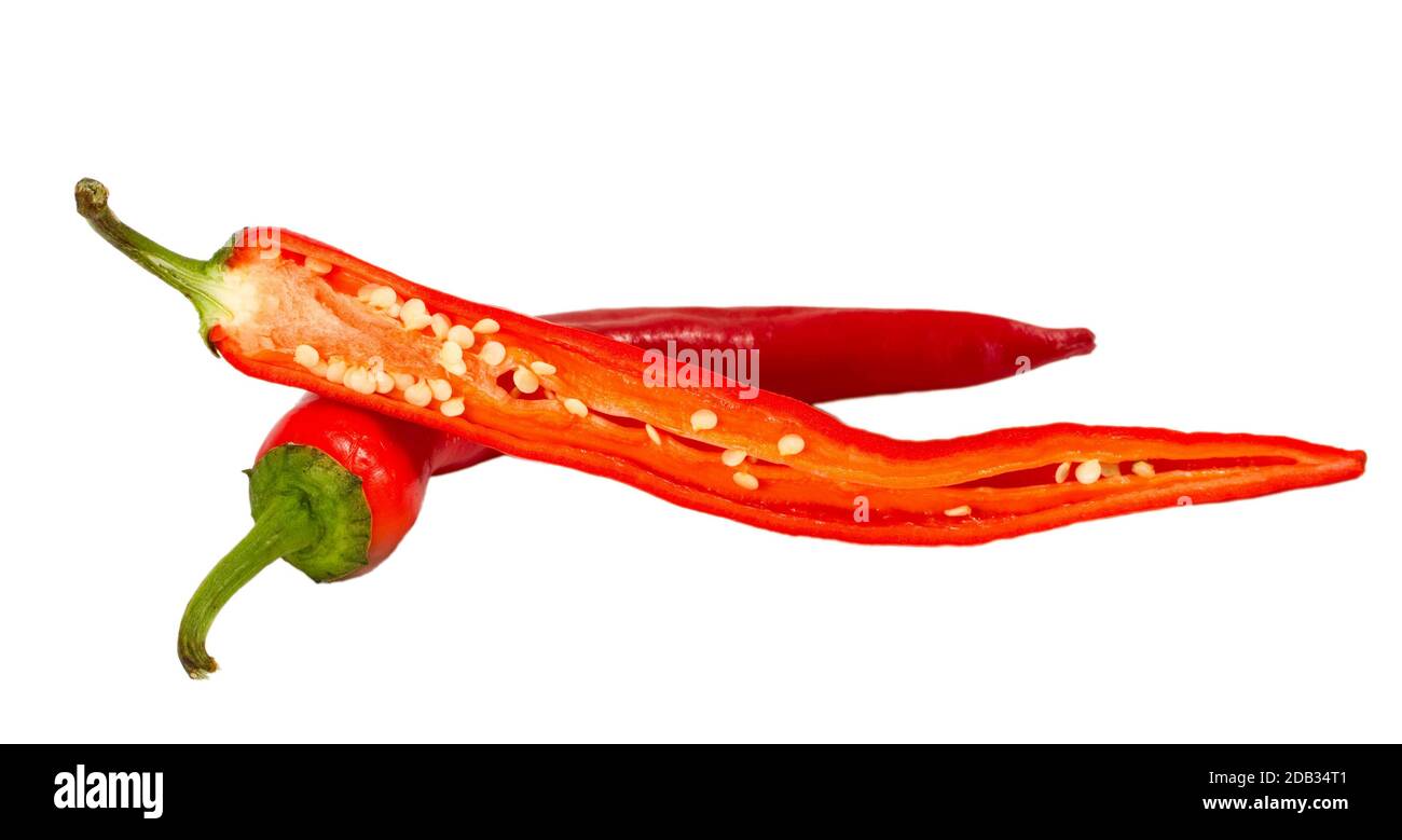 chilli pepper cut isolated on white background Stock Photo - Alamy