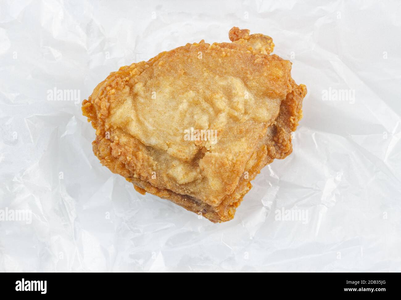 Batter-fried chicken isolated on cooking oil absorbing paper (clipping ...