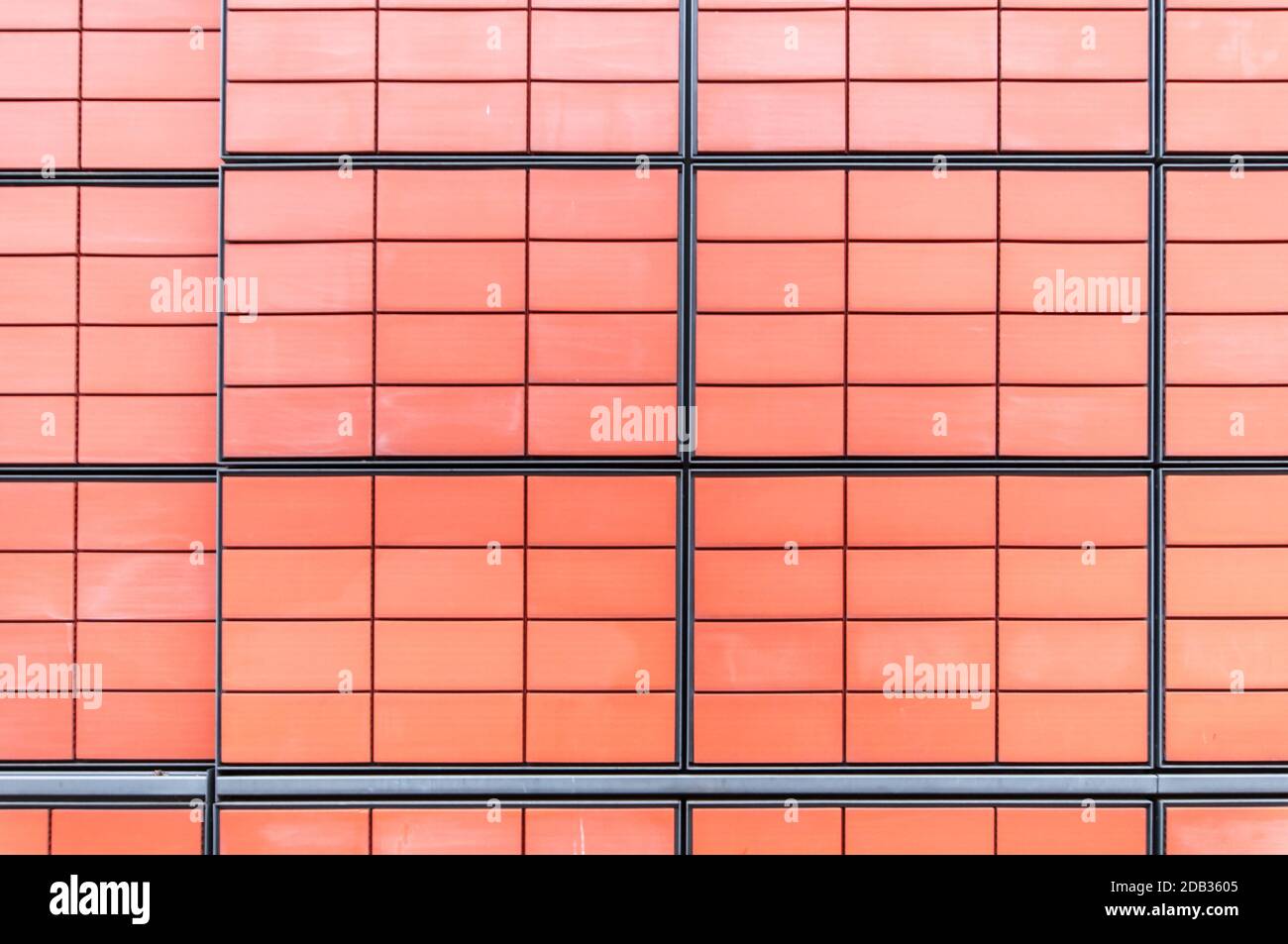 Partial format view of a house wall with terracotta-colored tiles Stock ...