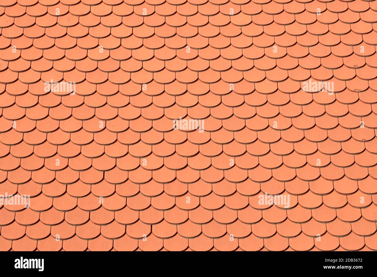 Roof with bright red tiles Stock Photo - Alamy
