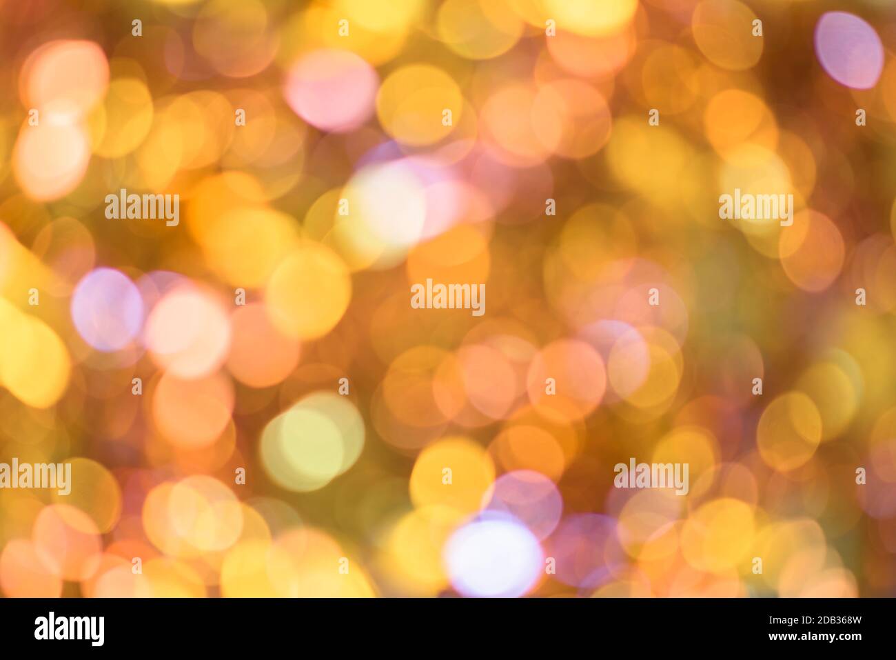 Background texture full of unsharp golden and pink shining bokeh ...