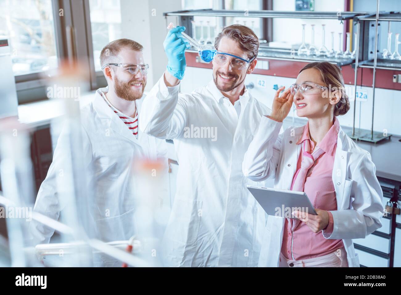 Scientists doing science in the lab Stock Photo - Alamy