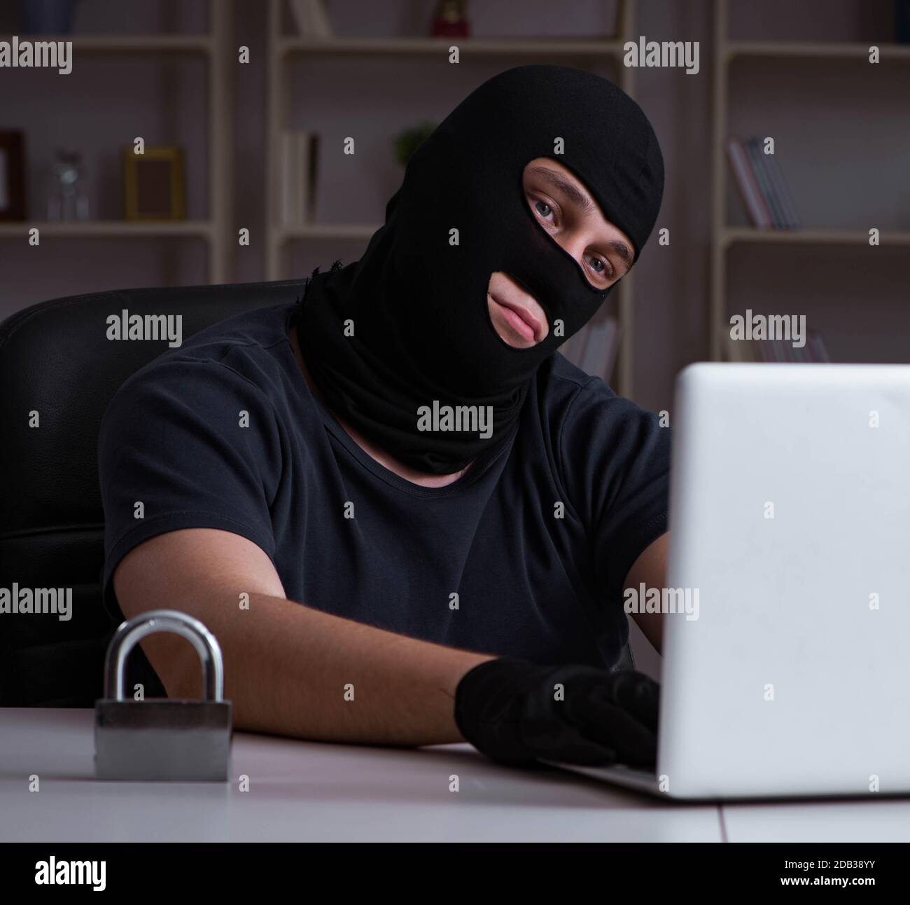 The hacker hacking computer late at night Stock Photo - Alamy