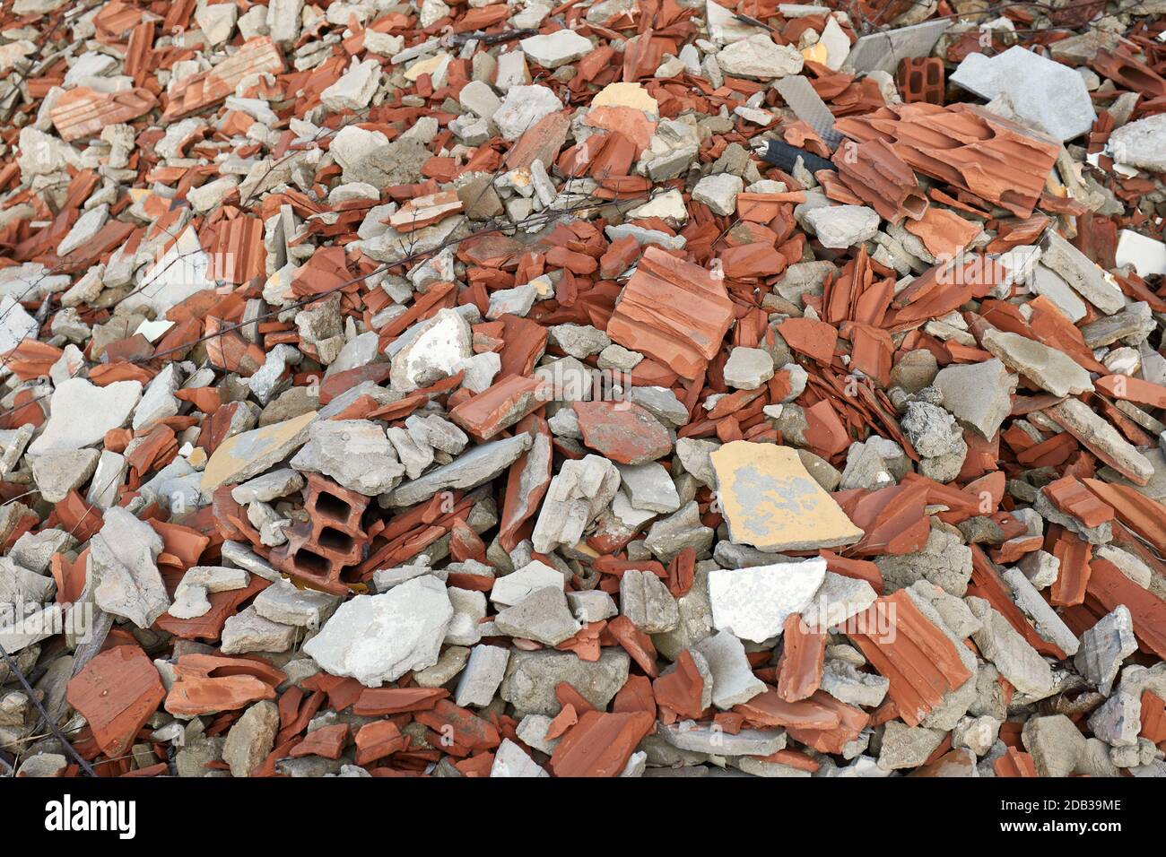 Pile of debris of a destroyed building, mostly tiles and bricks Stock ...