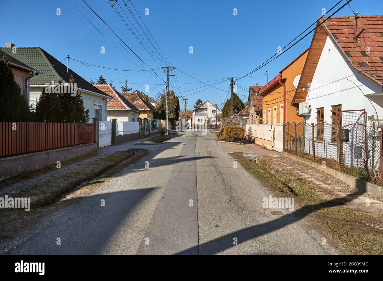 Village street with houses, generic view in Ecser, Hungary Stock Photo ...