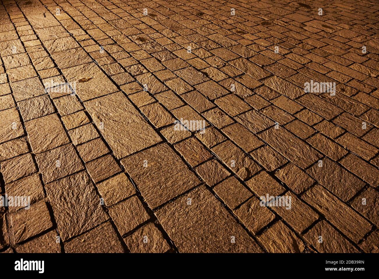 Dark pavement made of old stones in the dark of night Stock Photo - Alamy