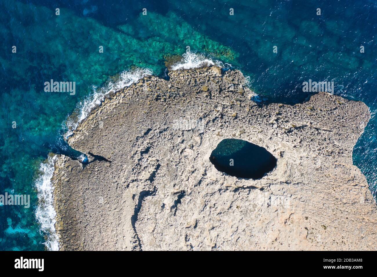 Big natural hole in the rock. Coral Lagoon. Malta island Stock Photo ...