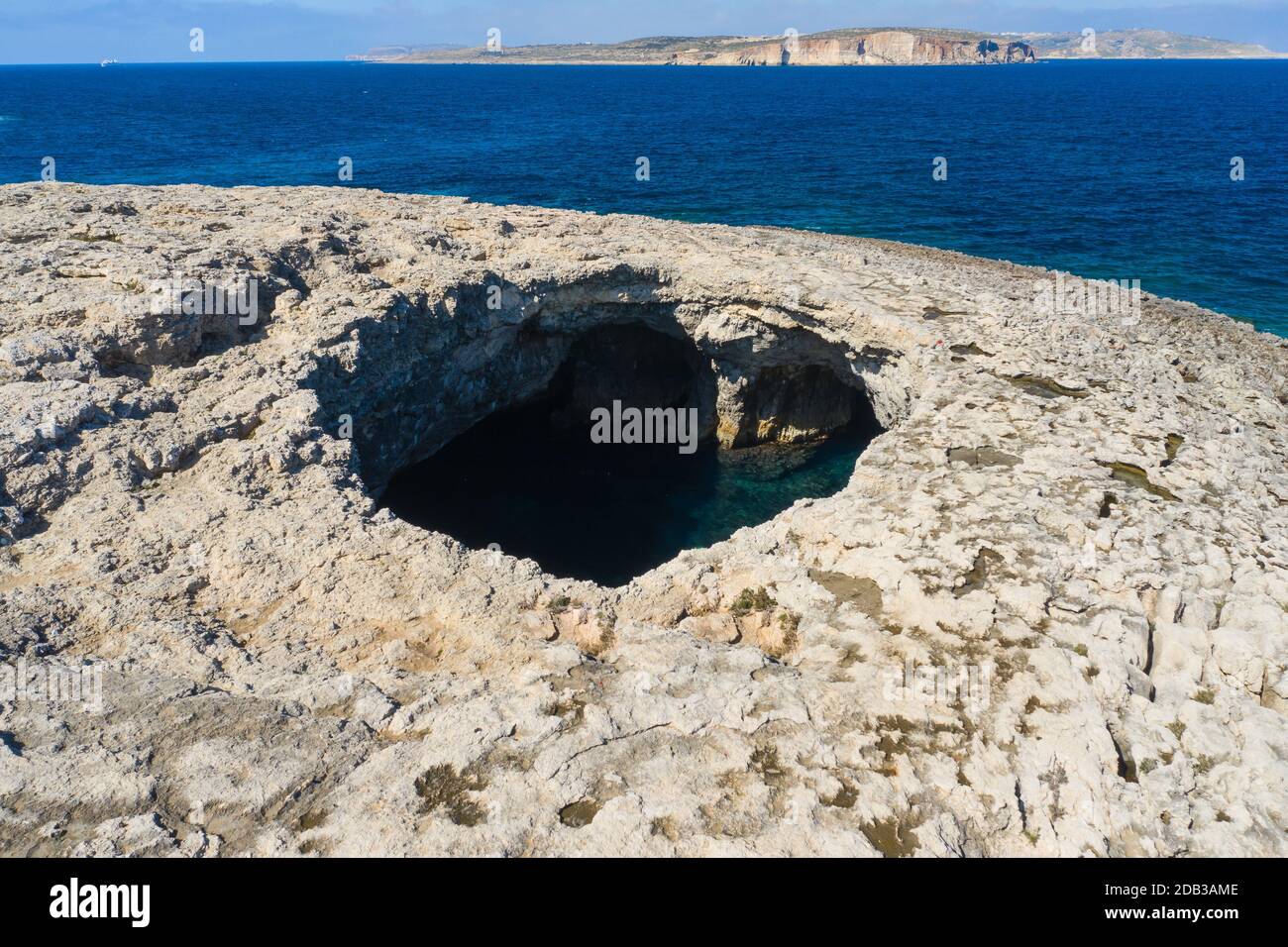 Big natural hole in the rock. Coral Lagoon. Malta island Stock Photo ...