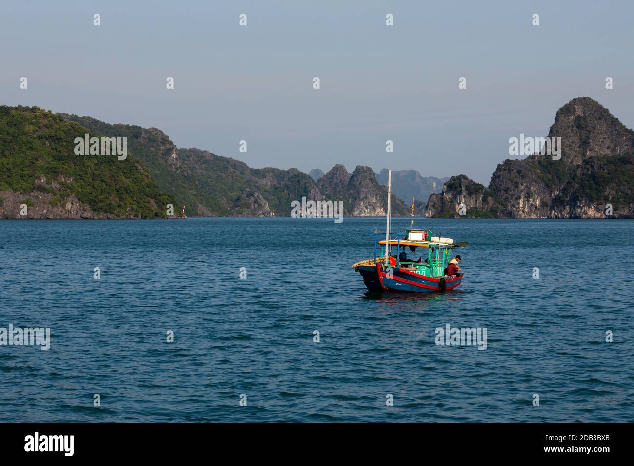 Halong bay and fishing boat hi-res stock photography and images - Alamy