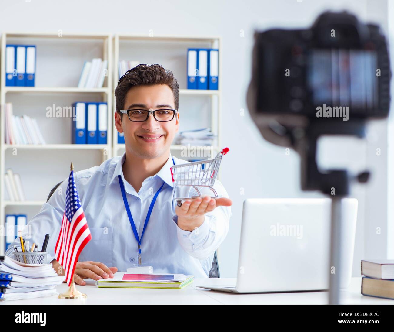 The businessman explaining online shopping in video blog Stock Photo ...