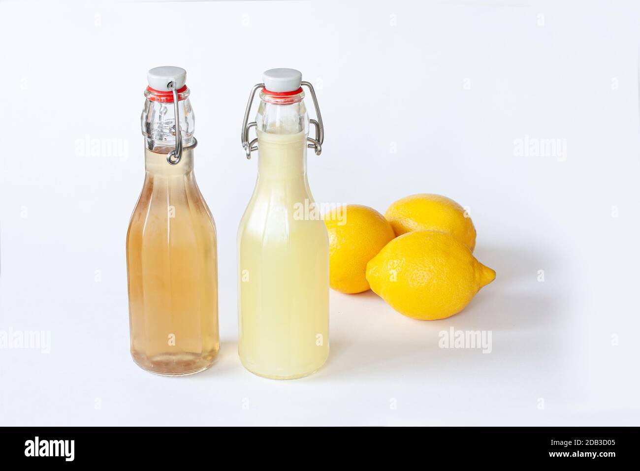 Two flip-top patent closure bottles with homemade lemon syrup or juice ...