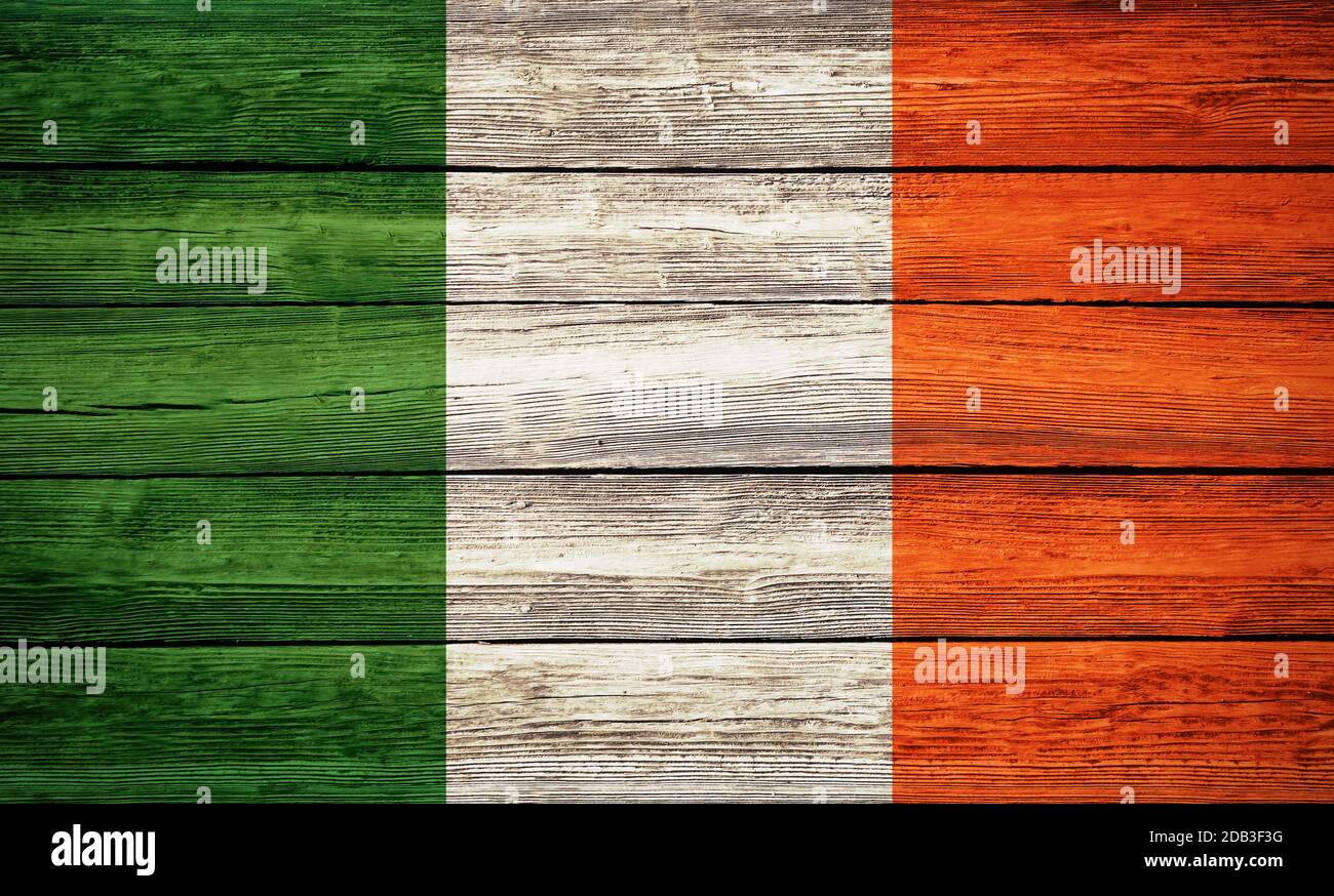 Ireland national flag colors painted on old wooden plank background ...