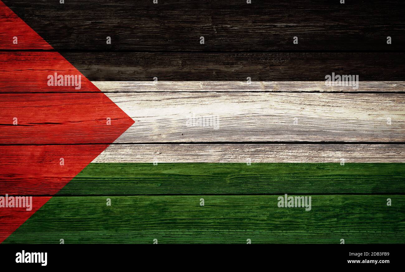 Palestine national flag colors painted on old wooden plank background ...
