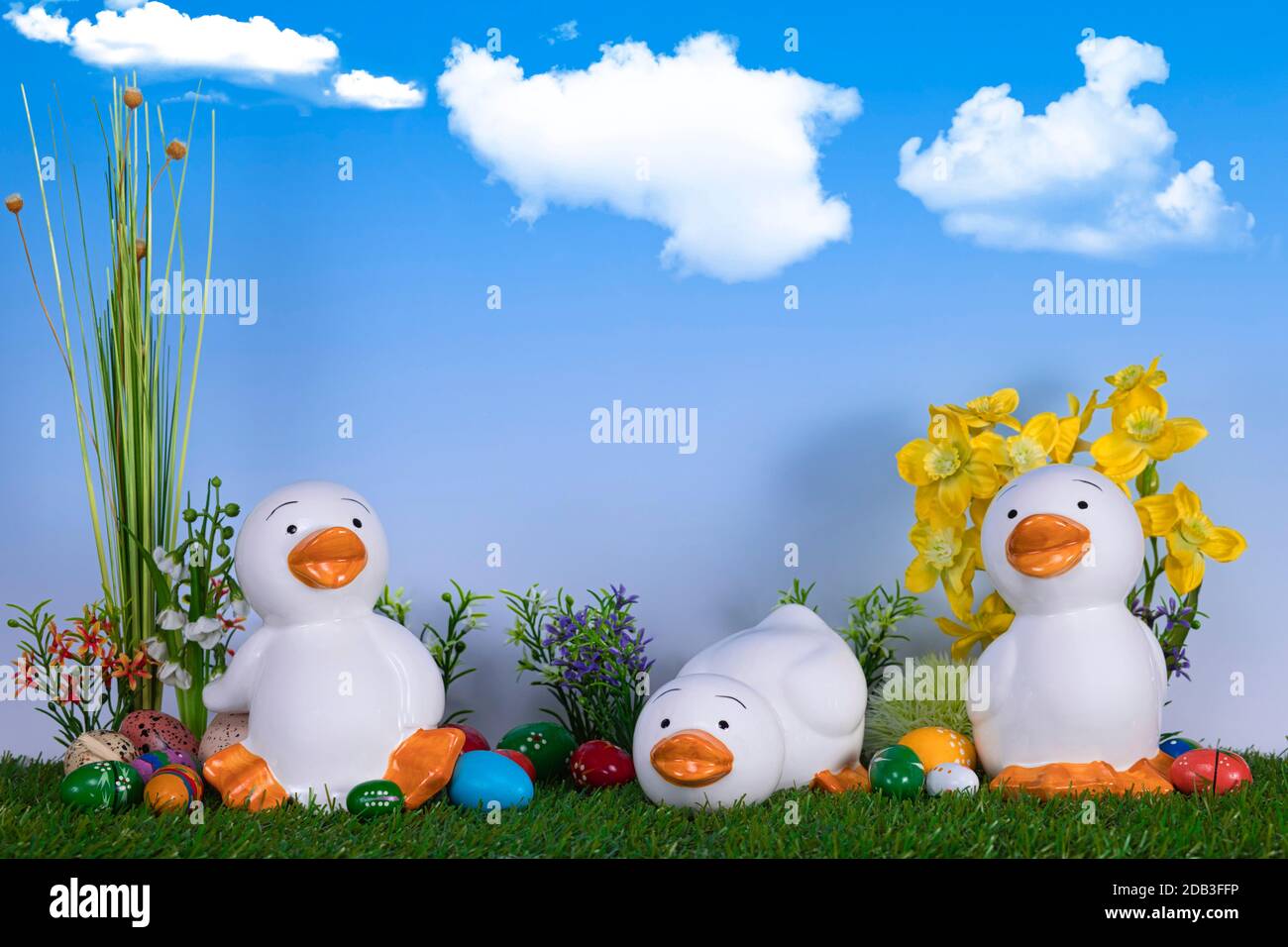 Three ducks on the Easter meadow Stock Photo - Alamy