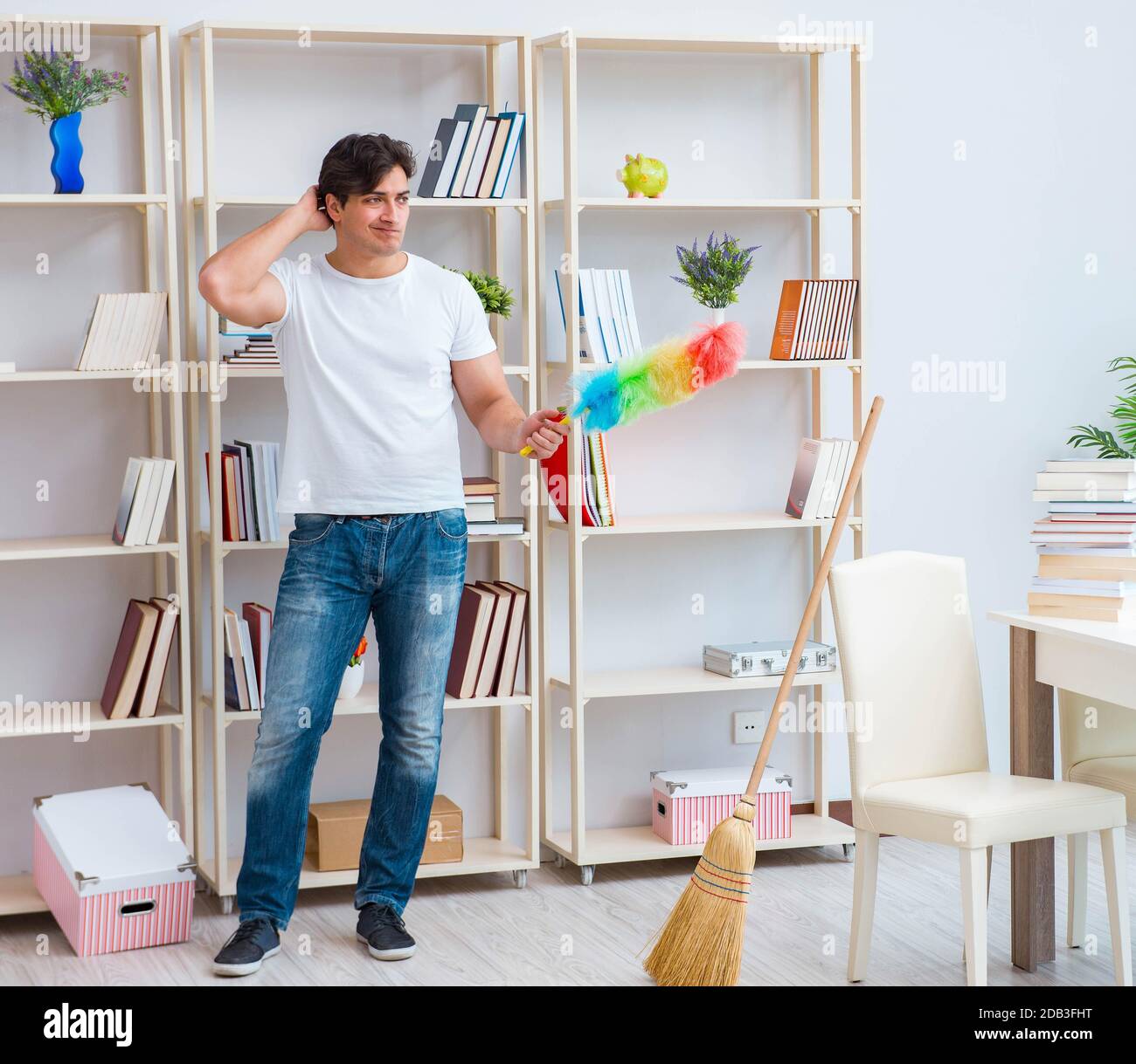 The man doing cleaning at home Stock Photo - Alamy
